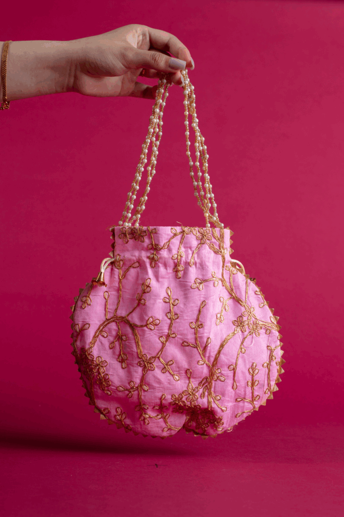 Thread work embroidered potli bag